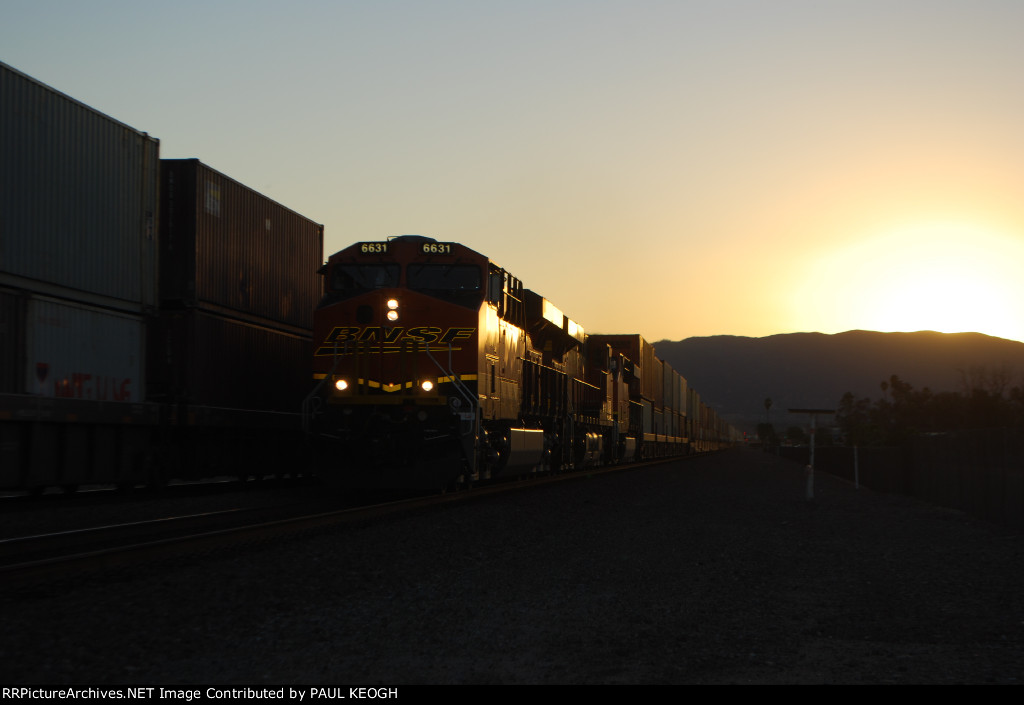 BNSF 6631 passes a westbound Z at Sunset as she heads eastbound towards San Bernardino, Ca.